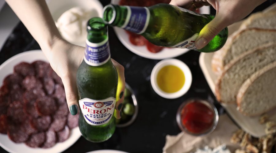A simple platter and some crisp bottles of Peroni are the only things ...