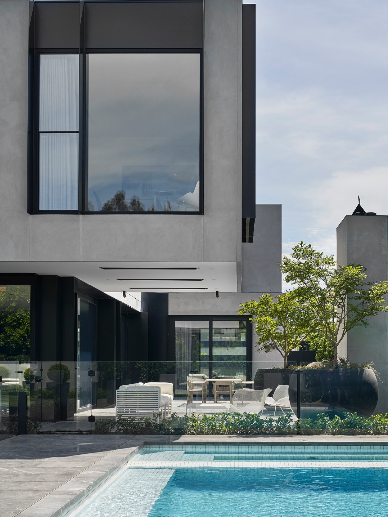 A love of cars and custom design collide in this modern Melbourne home