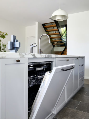 A thoughtfully designed Fisher & Paykel kitchen is the heart of this ...