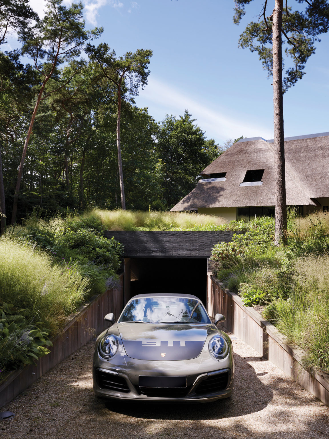 A spectacular Netherlands home by Studio Piet Boon is nestled in the woods